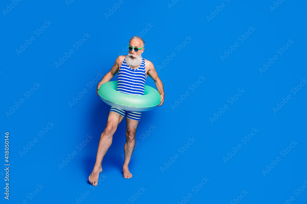 Full size photo of funky funny old man in glasses and buoy trying water ...