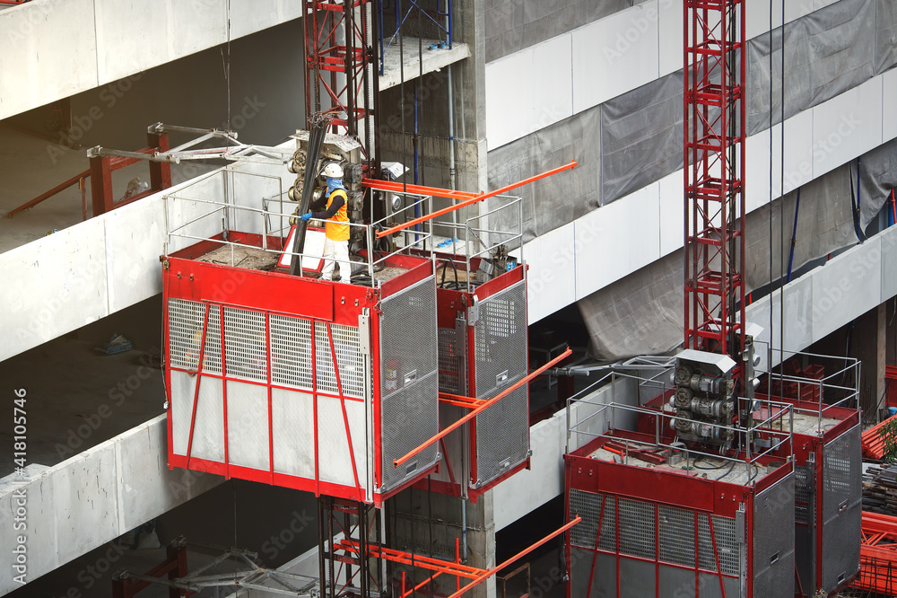 Elevators used for worker and moving materials in Construction site ...