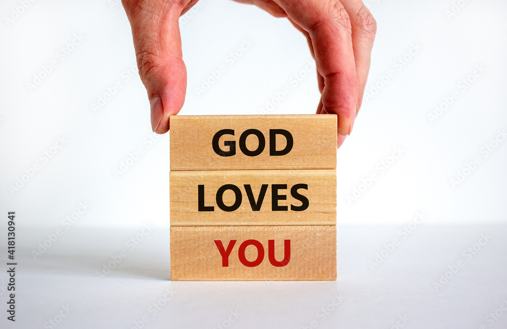 God loves you symbol. Concept words 'God loves you' on wooden blocks on ...