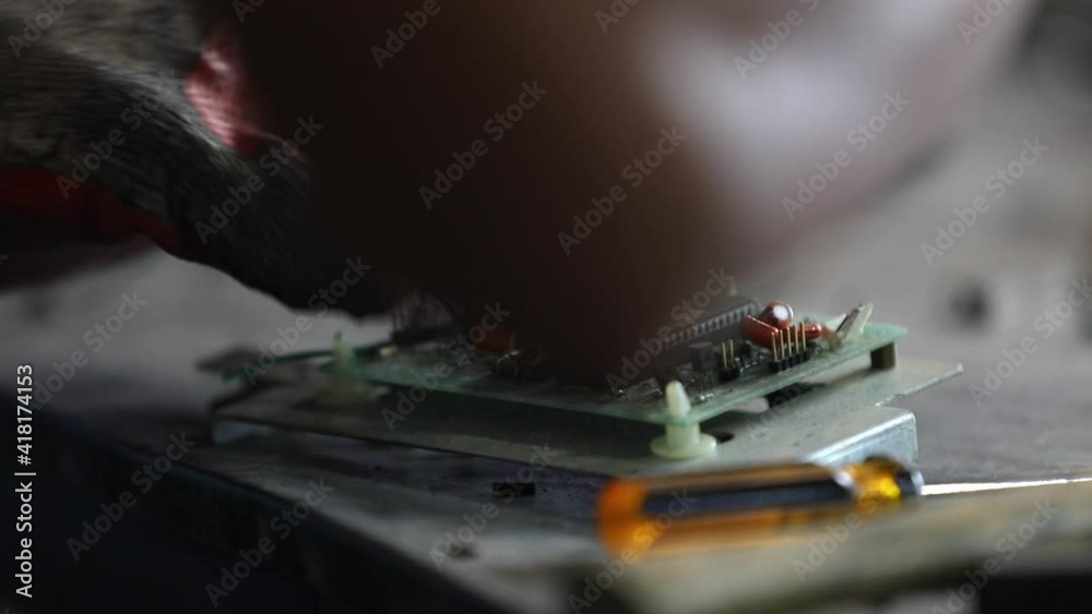 Dismantling computer parts to reuse or recycle safely - isolated close ...