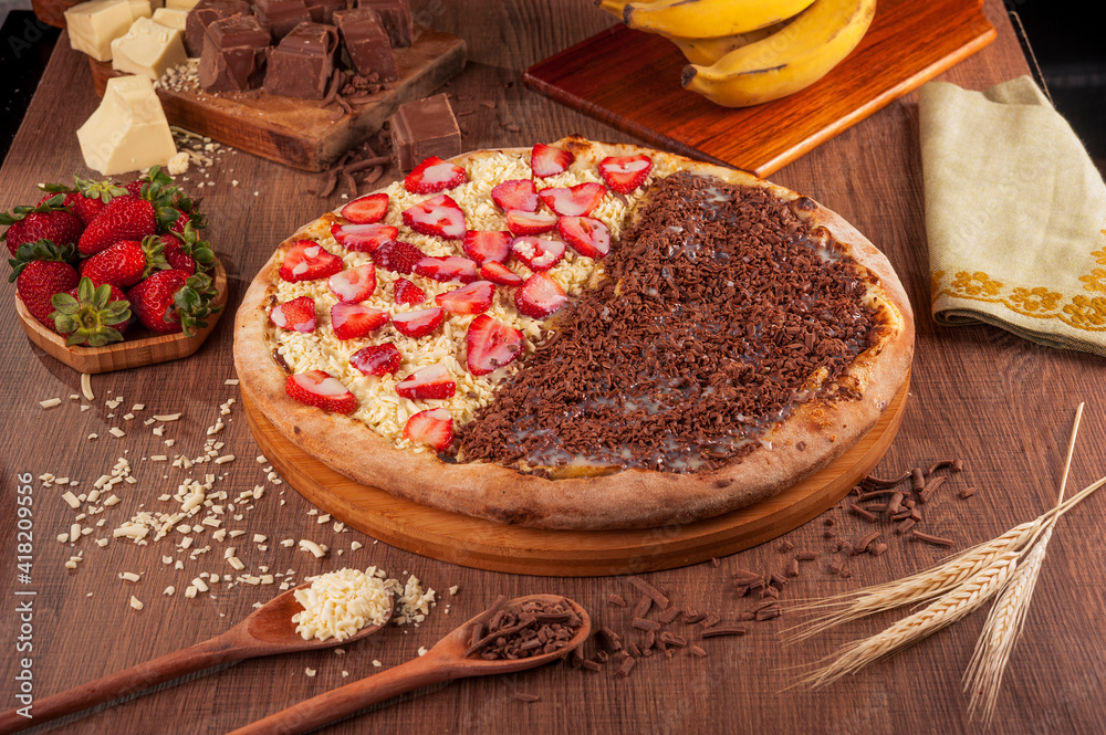 Half to half pizza strawberry with white chocolate and banana with ...