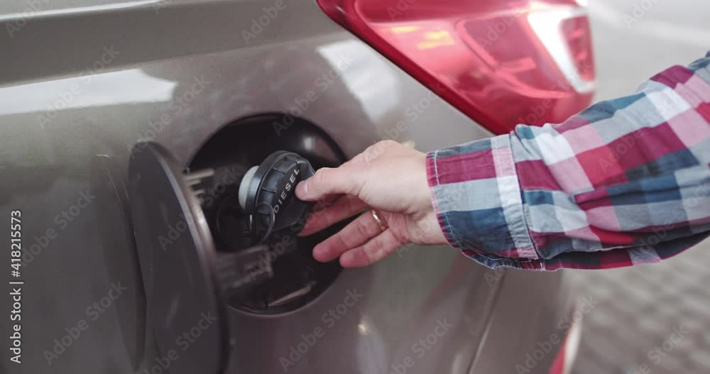 Vídeo do Stock: Close-up Of A Man Fueling With Diesel In A Car At A Gas ...