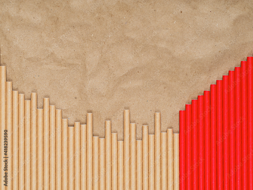 paper straws for drinks of two colors are laid out in the form of a ...