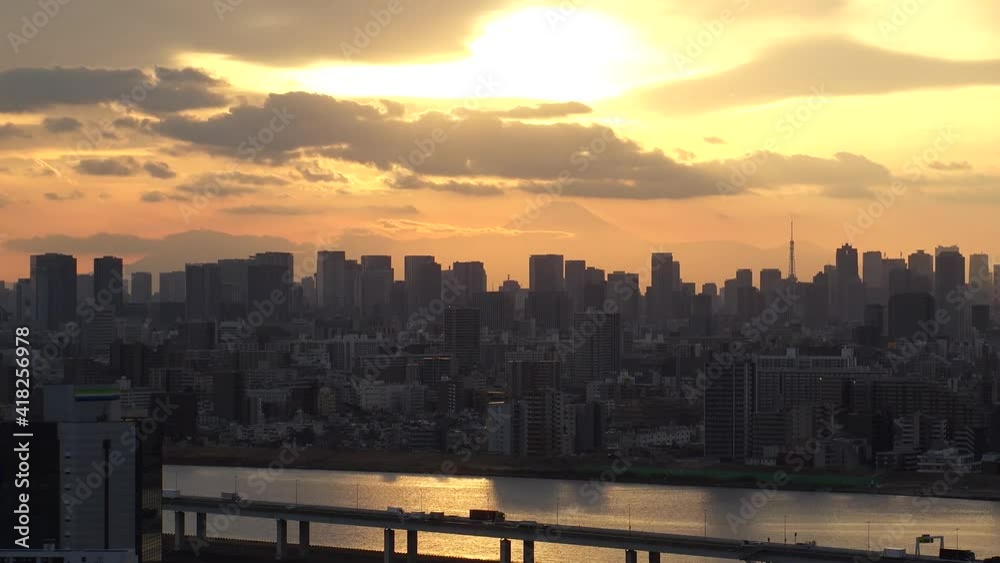 TOKYO, JAPAN : Aerial sunset CITYSCAPE of TOKYO and MOUNT FUJI. View of ...