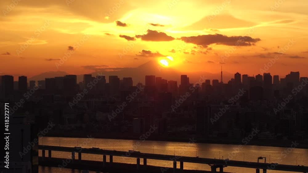 TOKYO, JAPAN : Aerial sunset CITYSCAPE of TOKYO and MOUNT FUJI. View of ...