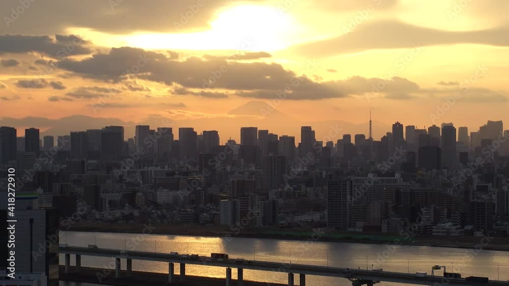 TOKYO, JAPAN : Aerial sunset CITYSCAPE of TOKYO and MOUNT FUJI. View of ...