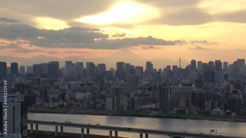 TOKYO, JAPAN : Aerial sunset CITYSCAPE of TOKYO and MOUNT FUJI. View of ...