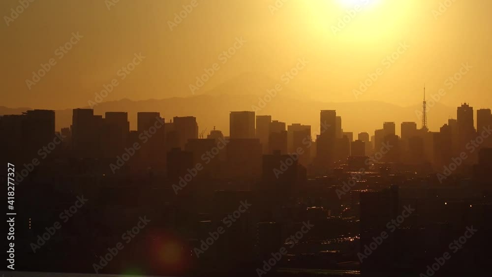 TOKYO, JAPAN : Aerial sunset CITYSCAPE of TOKYO and MOUNT FUJI. View of ...