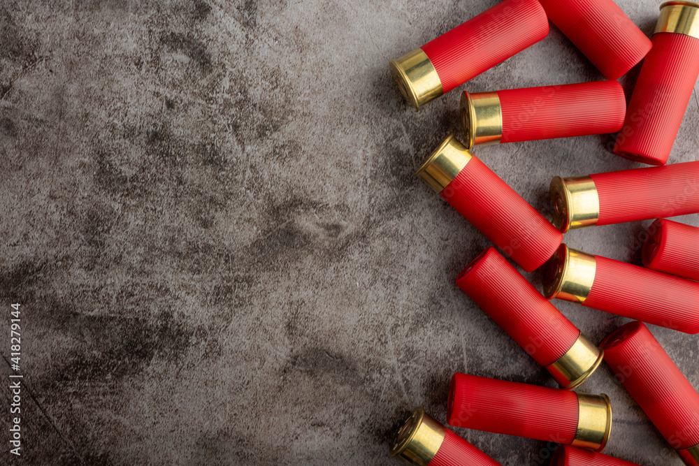 Red shotgun shell on texture background , Gun bullets can be used as a ...