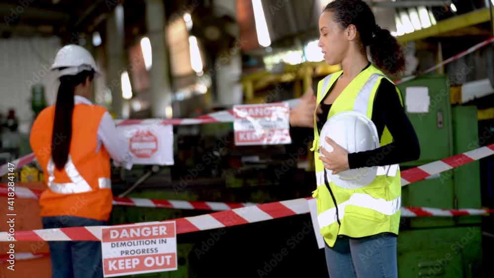 factory worker woman feeling bad and upset and standing in front of ...