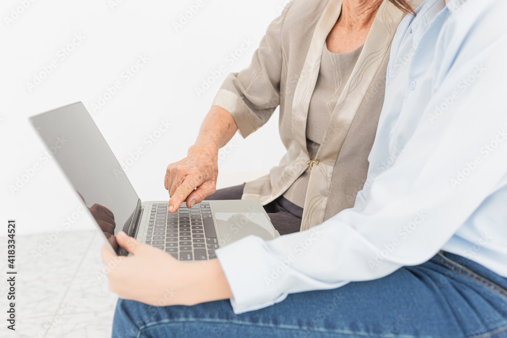 close up hand of old woman, old woman use finger typing in keyboard of ...