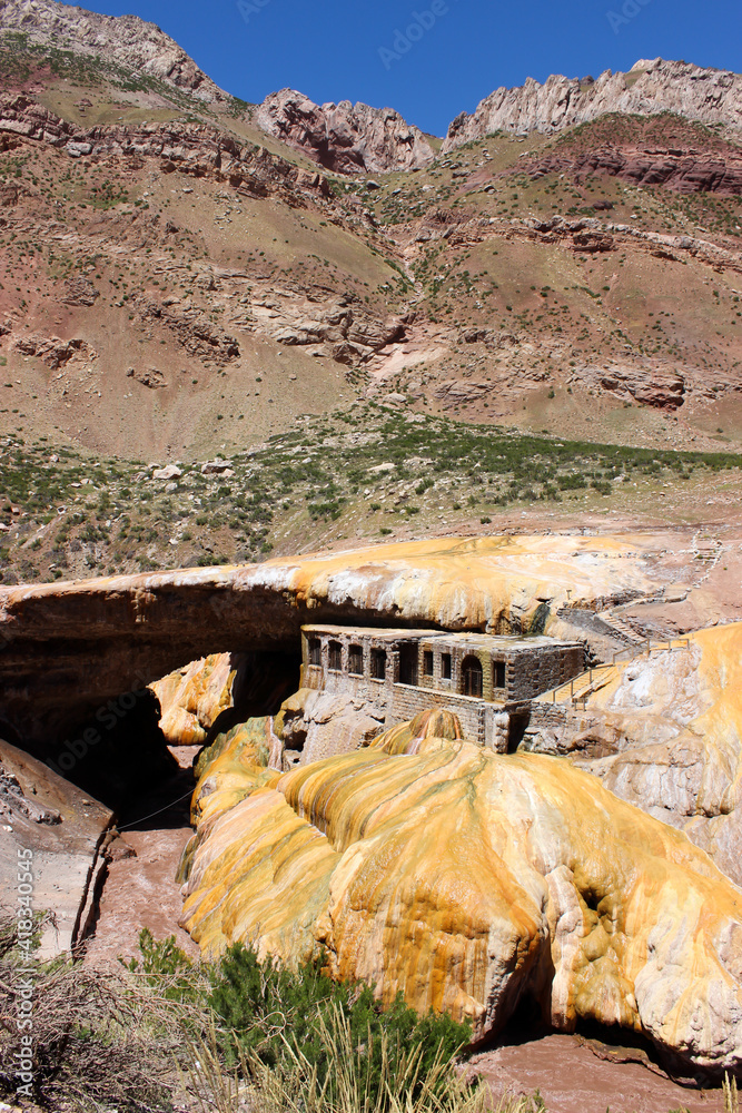 Thermal hotel ruins on Puente del Inca (Inca Bridge) over Las Cuevas ...