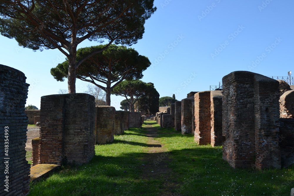 Ancient Roman Street in Ostia Antica with brick houses Rome Italy Stock ...