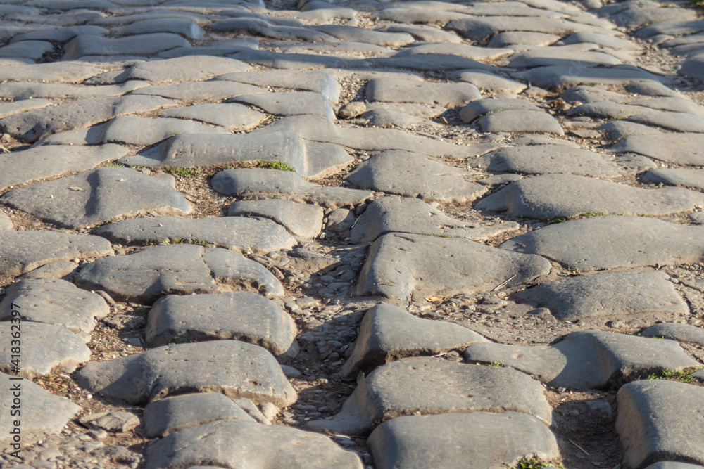 Stamp Wheel tracks on ancient roman cobble street,The first important ...