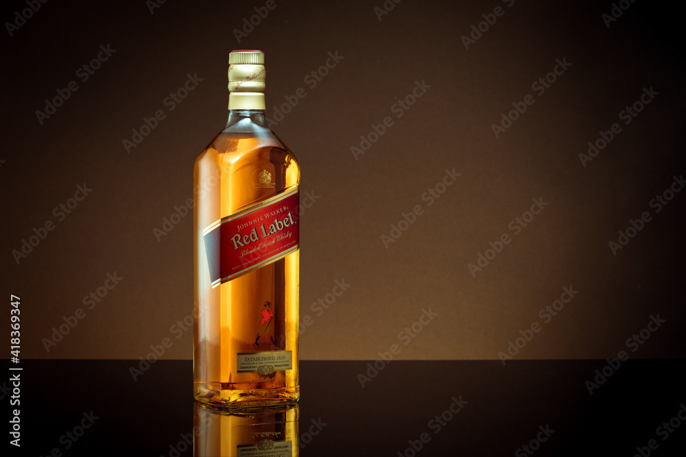 Phuket, Thailand- Feb 2021. Johnnie Walker Red Label blended whisky ...