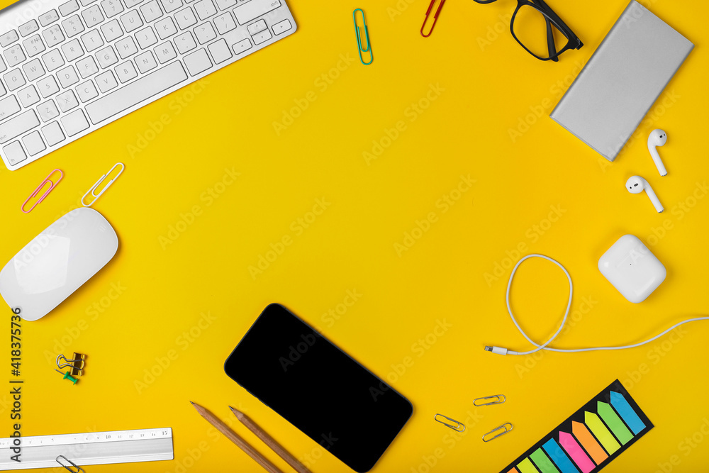 Mockup of smart gadgets on the background of office items on yellow ...