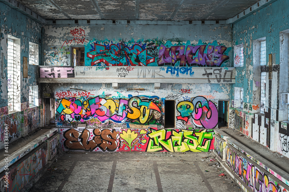 Abandoned Soviet time swimming pool and sports hall complex. Colorful ...