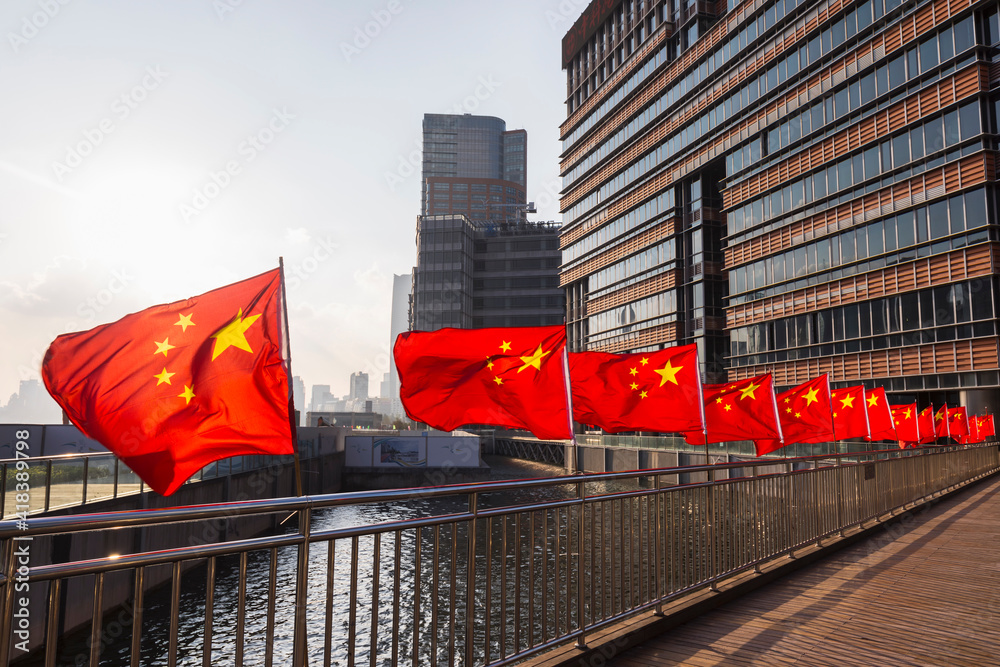 Row of Chinese flags on Huangpu river promenade, Shanghai, China Stock ...