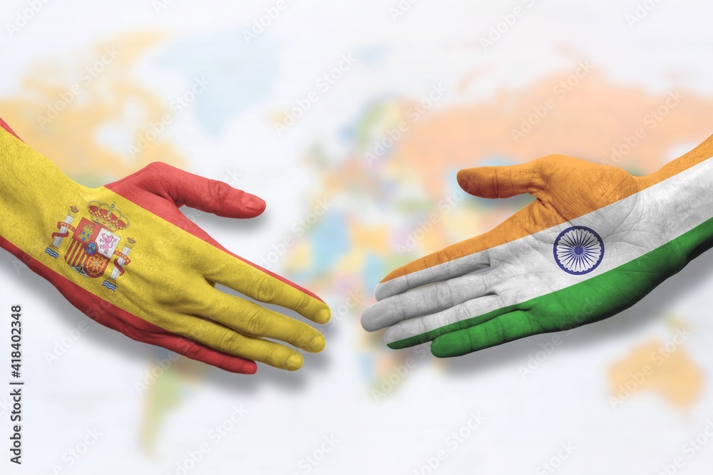 Spain and India - Flag handshake symbolizing partnership and ...