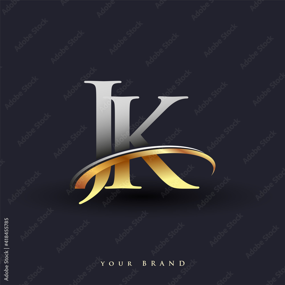 JK initial logo company name colored gold and silver swoosh design ...