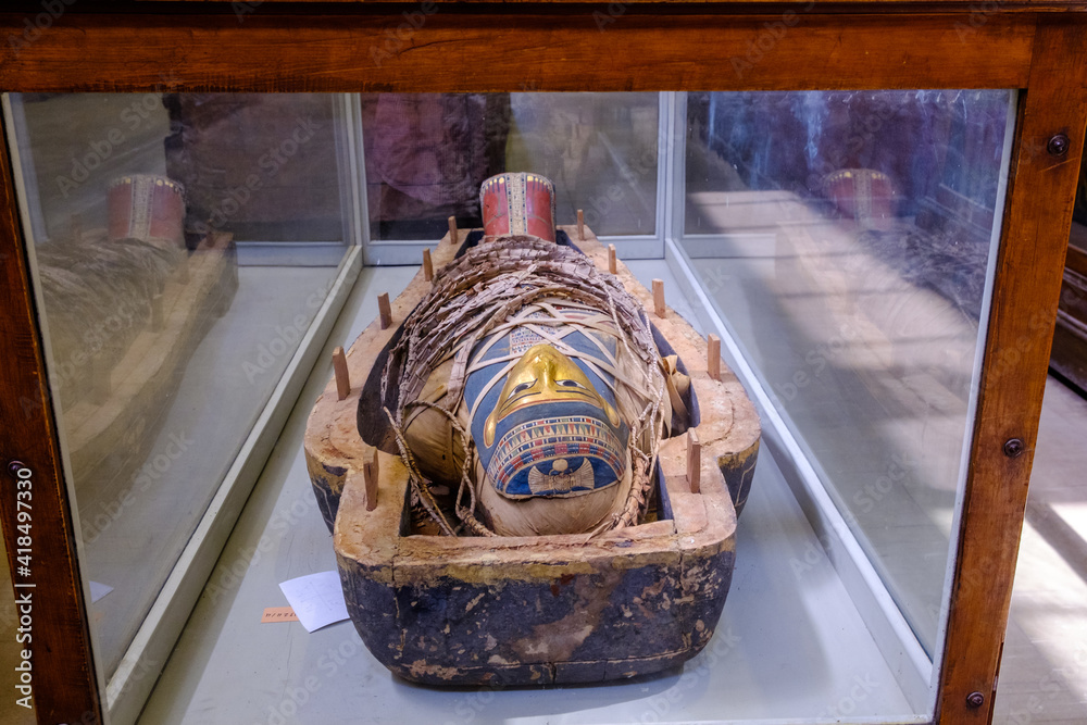 Ancient Egyptian sarcophagi and mummy caskets displayed in the Egyptian ...
