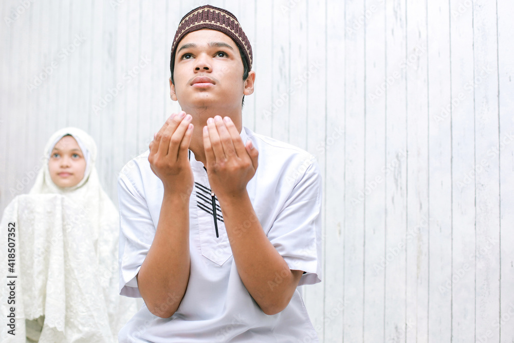 Muslim Couple Praying Together