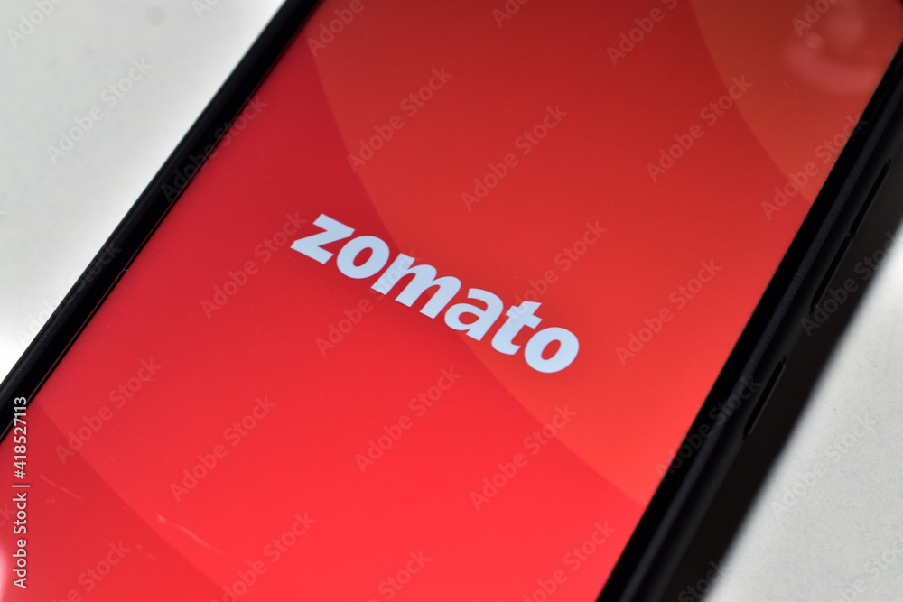 Zomato logo on smartphone, application for online food ordering Stock ...