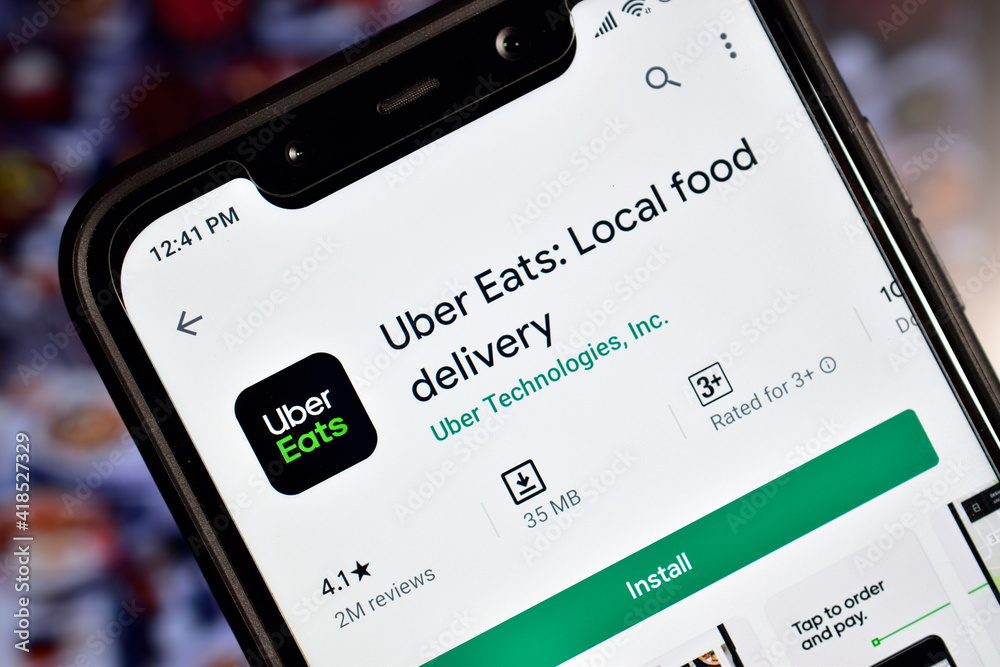 Uber Eats Application On Smartphone, Local Food Delivery Application ...