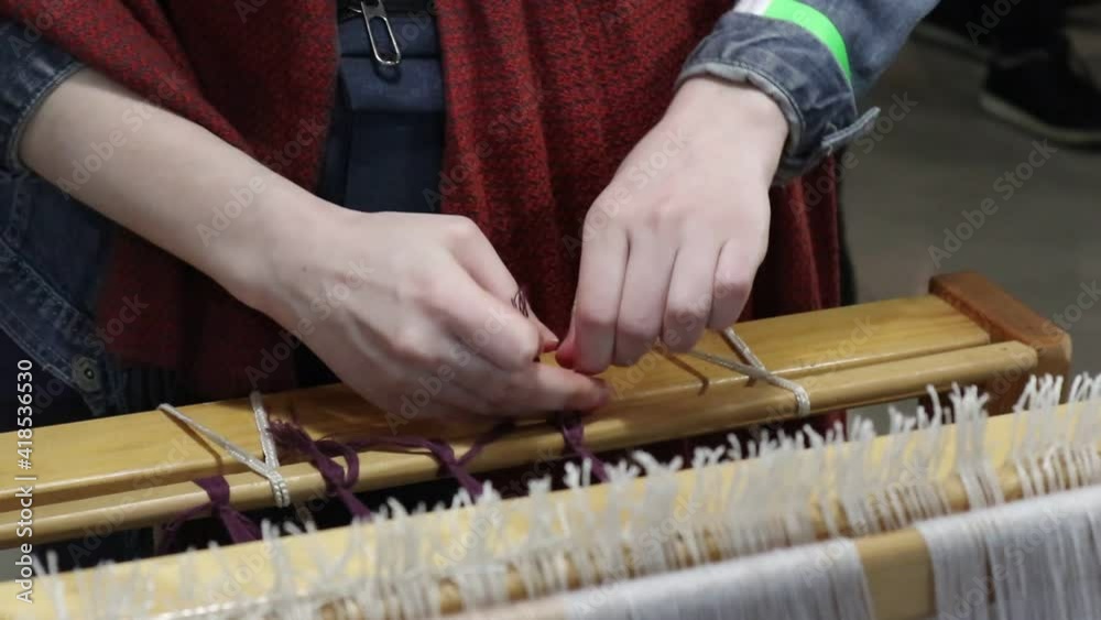 Woman working on weaving machine for weave handmade fabric. Textile ...