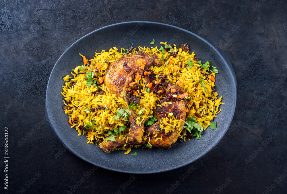 Modern style traditional fried Arabic chicken majboos with chicken leg ...