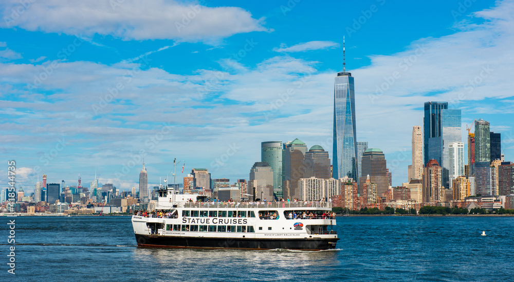 NEW YORK, USA - September 27, 2018: Statue Cruises ferry in Manhattan ...