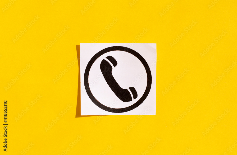 Phone icon, telephone symbol on a yellow background. Communication ...