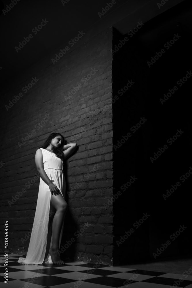 Indian girl, caucasian, brunette girl in white one leg cut gown with ...