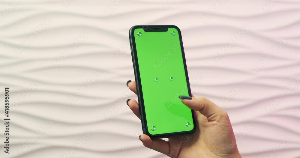 Phone green screen chroma key display with trackers for VFX compositing ...