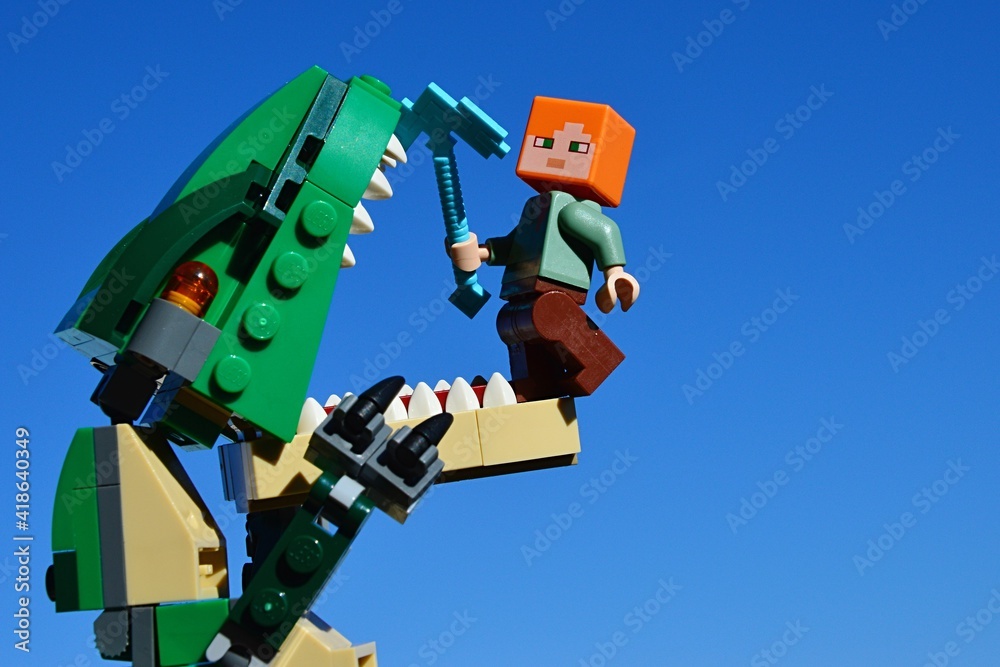 Brave LEGO Minecraft Alex character with diamong pickaxe checking teeth ...
