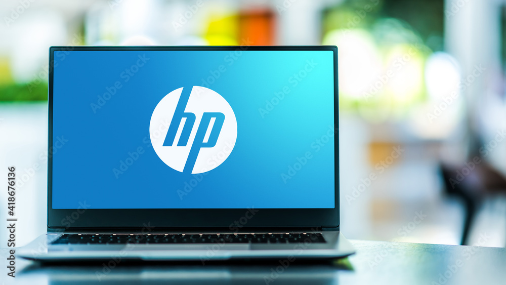 Laptop computer displaying logo of HP Stock Photo | Adobe Stock