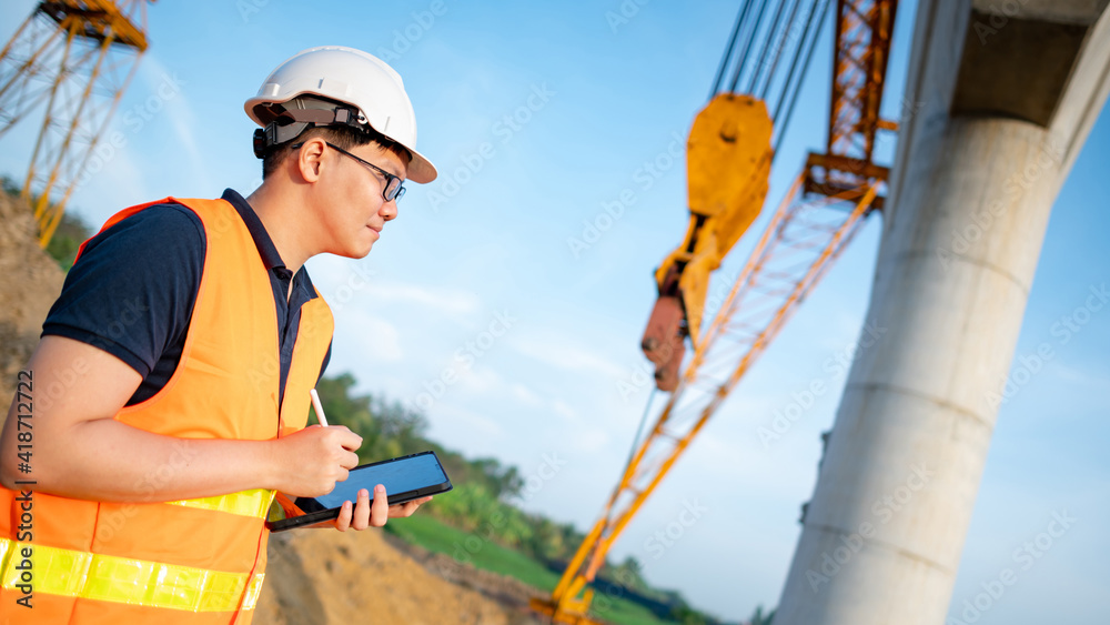 Smart Asian worker man or male civil engineer with protective safety ...