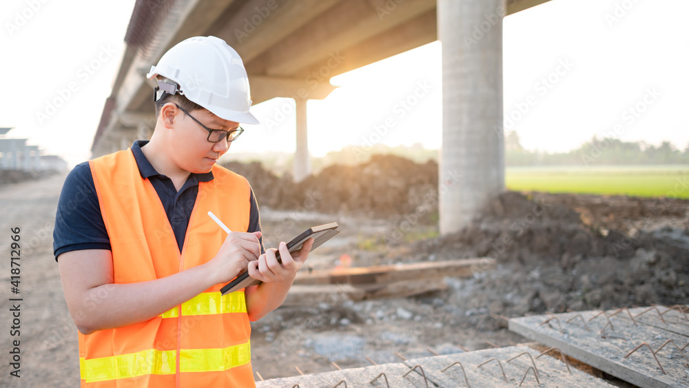 Smart Asian worker man or male civil engineer with protective safety ...