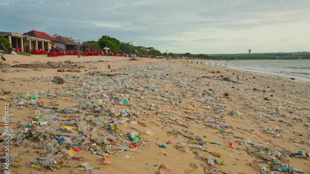 The sandy beaches of Bali are littered with plastic waste. Indonesia is ...