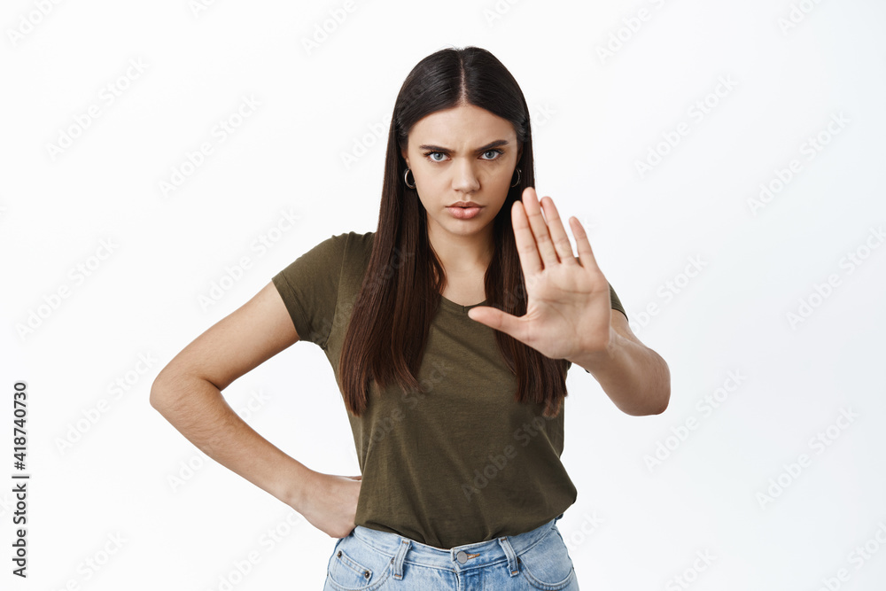 Stop, I said no. Angry frowning woman stretch out hand in block gesture ...