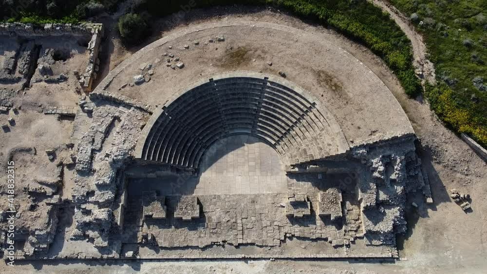 Wide aerial view of an ancient Greek Odeon, amphitheater. Top-down ...