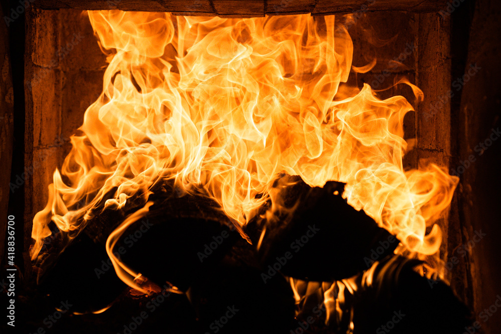 Burning wood. Cozy fire with logs. Glowing fireplace. Fire texture ...