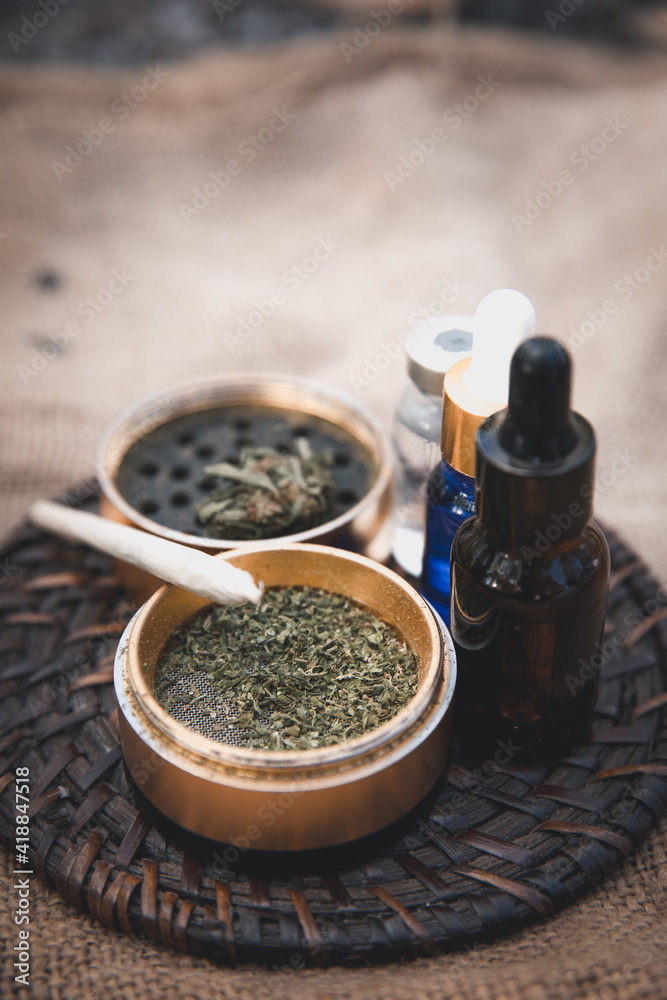 Preparing a joint and drug paraphernalia Stock Photo | Adobe Stock