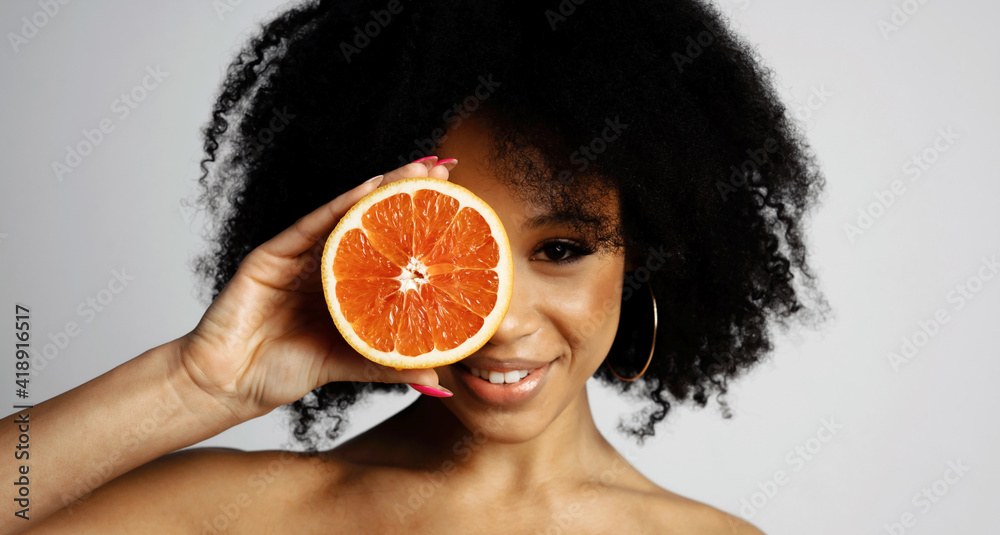 citrus, oranges, grapefruit holds bright ripe ones in his hands ...