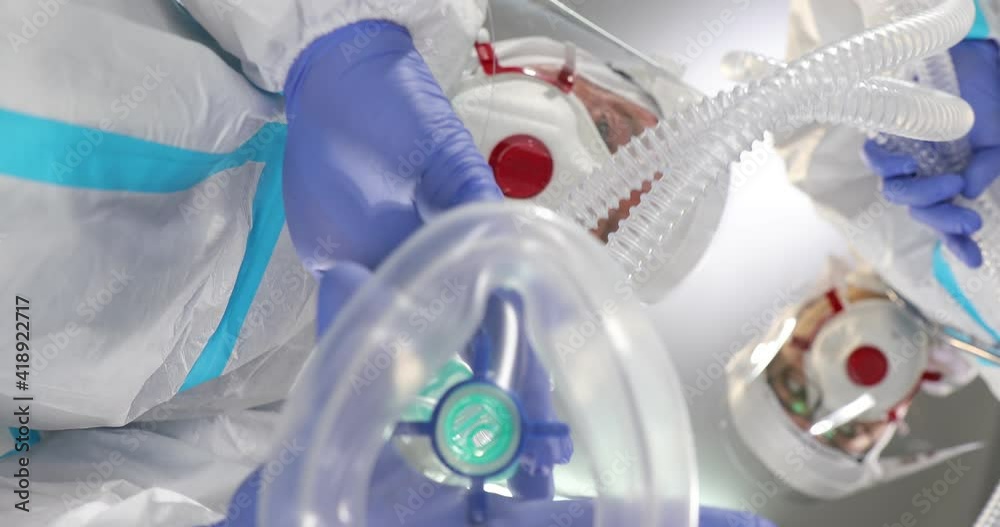 Two doctors holding medical instruments in the emergency room. Medical ...