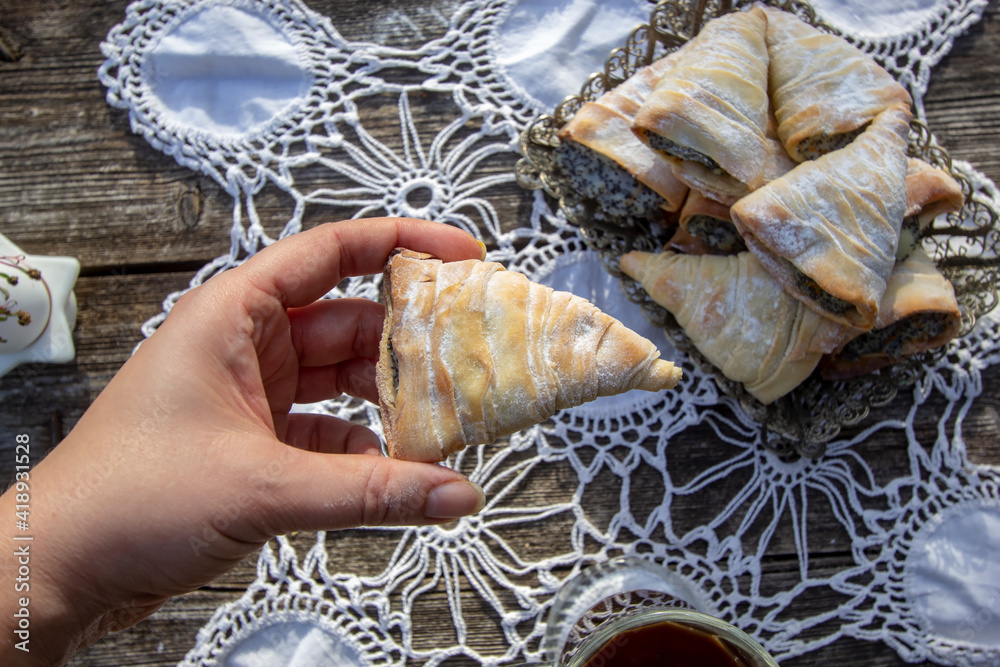 homemade Neapolitan puffs with poppy filling, sfogliatella. Dessert for ...