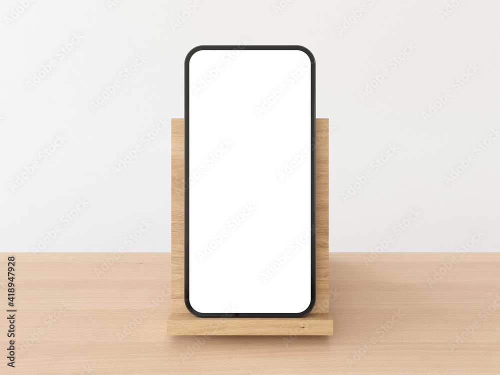 Smartphone frame with blank white display standing upright on wooden ...