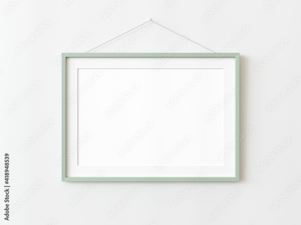One green wooden rectangular horizontal frame hanging on a white ...