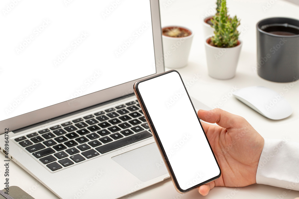 mockup image computer,cell phone and typing with blank screen for text ...