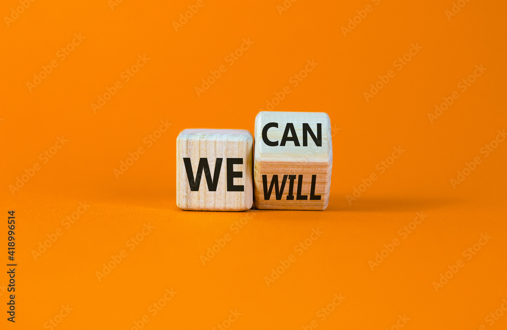 We can and will symbol. Turned a wooden cube and changed words we can ...